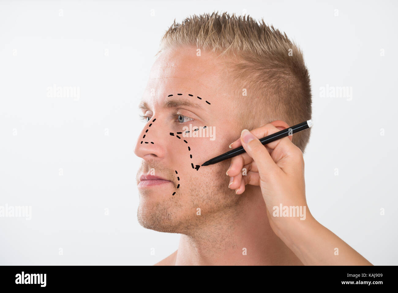 Close-up Of Person's Hand Drawing Correction Line With Pen Near Man's ...