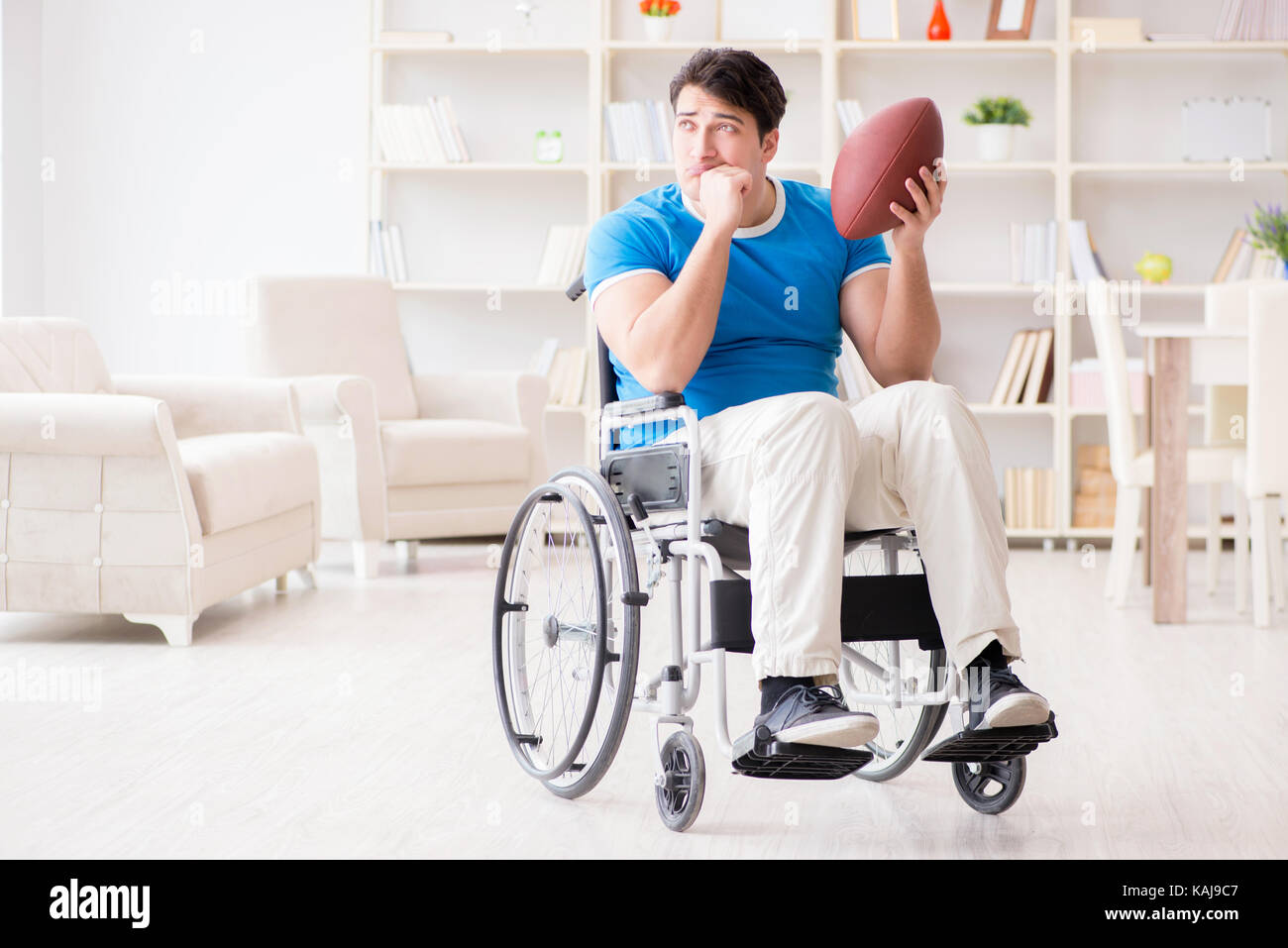 Young man american football player recovering on wheelchair Stock Photo ...