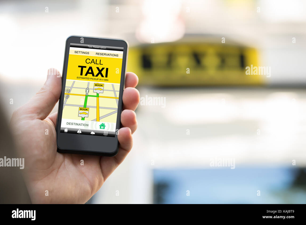 Close-up Of Person Booking Taxi On Smart Phone Stock Photo - Alamy