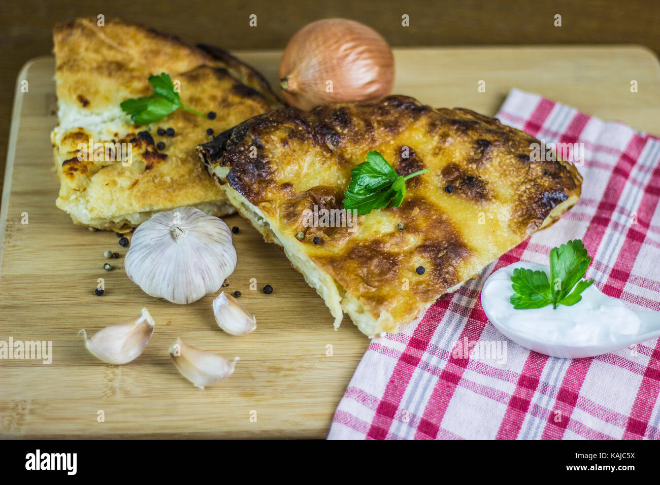 Cheese burek composition on dark background Stock Photo - Alamy