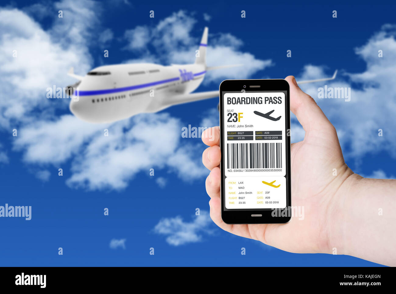 Hand hold a phone with boarding pass on a screen on the background of a ...