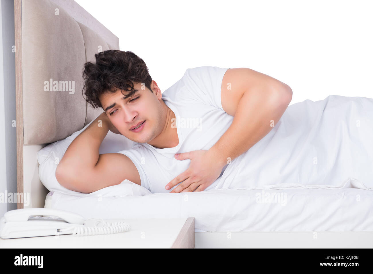 Man in bed suffering from insomnia Stock Photo - Alamy