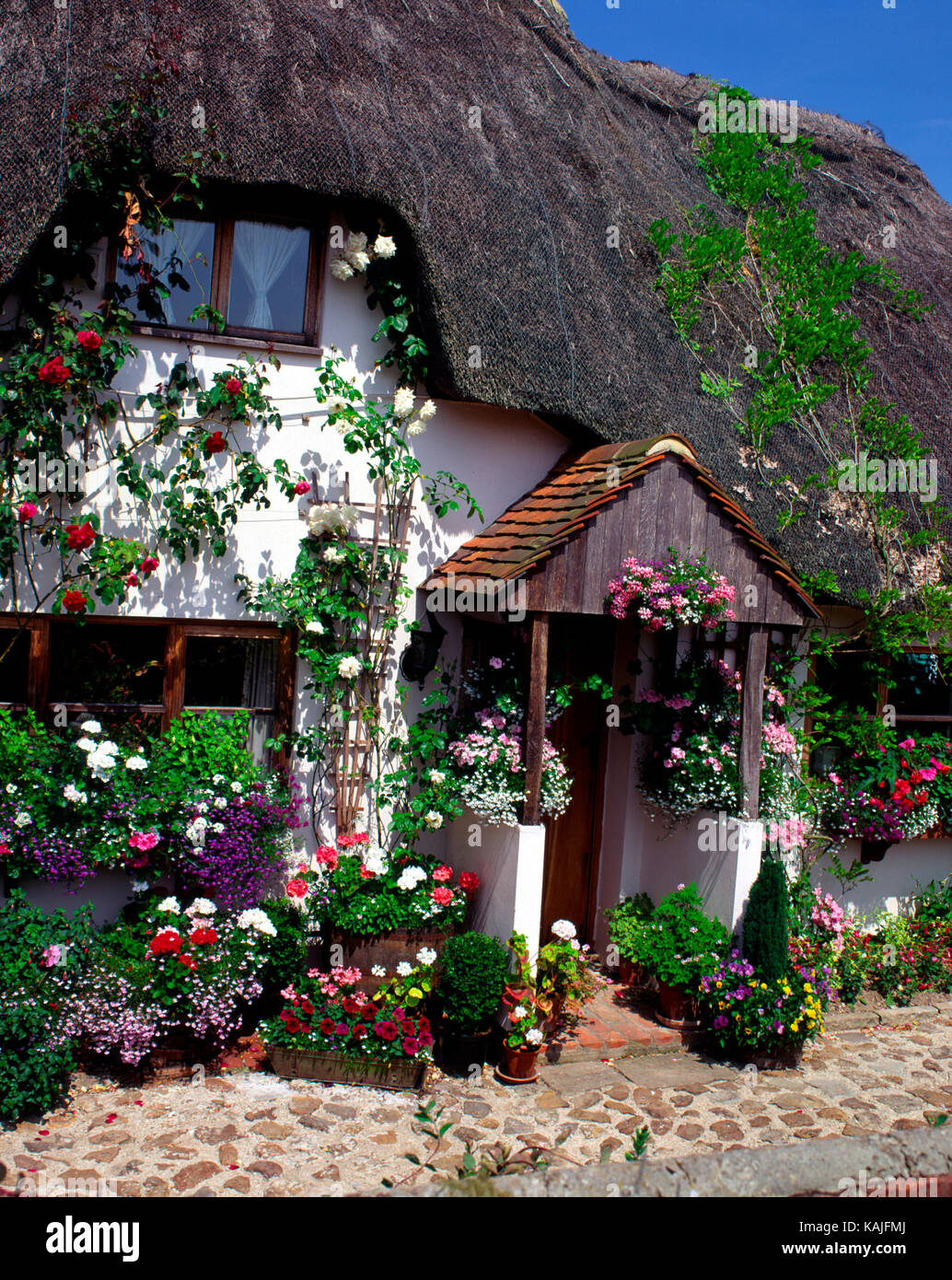 Typical Thatched Cottage Stock Photos & Typical Thatched Cottage Stock ...