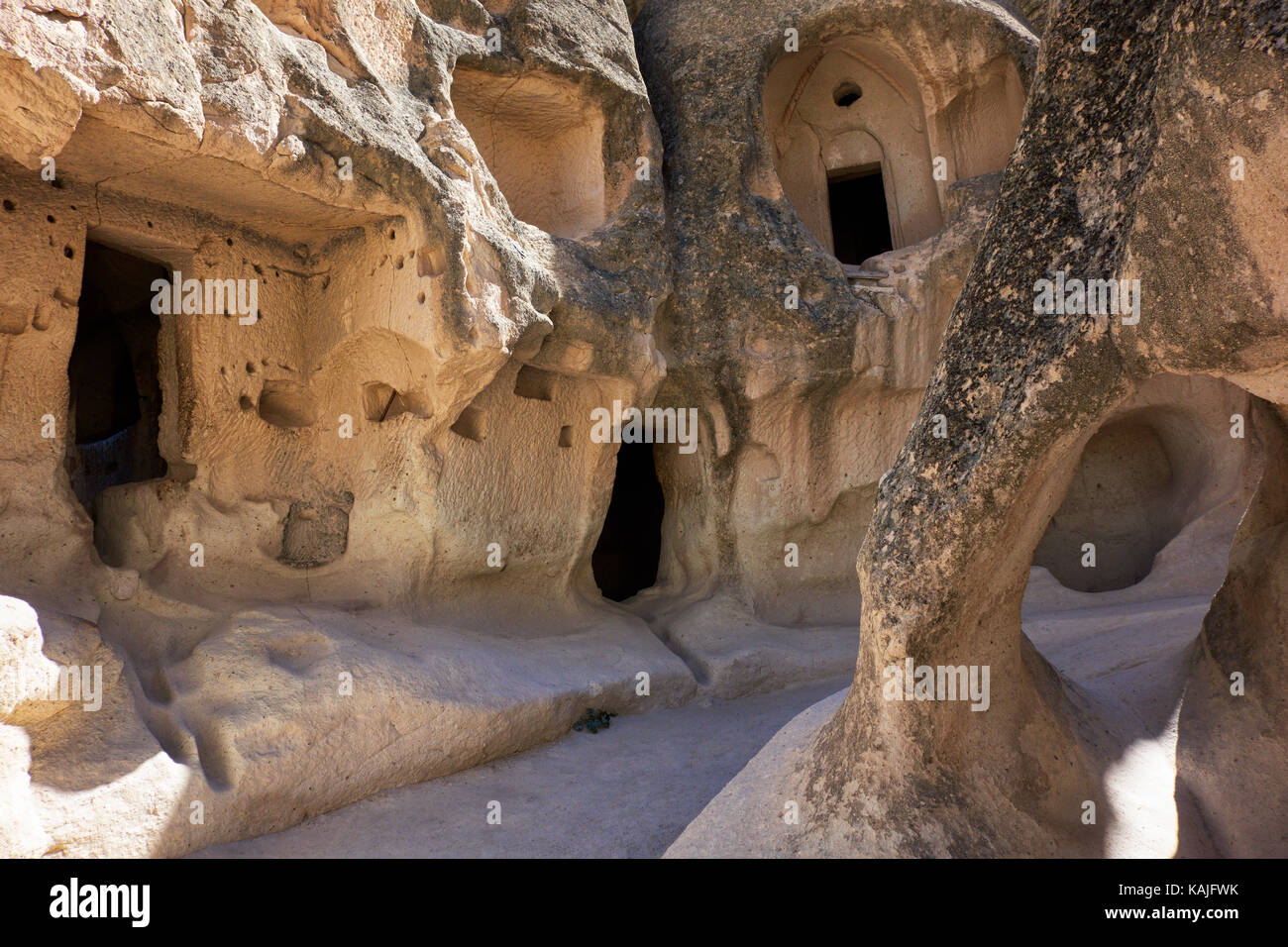 Typical rock house in fairy chimneys, eroded sandstone rock formations ...