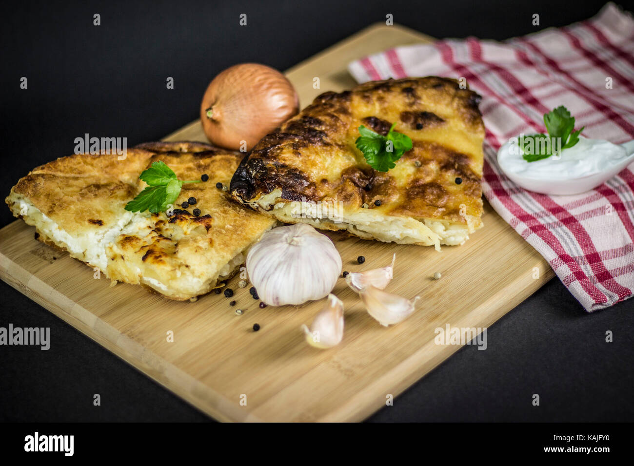 Cheese burek composition on dark background Stock Photo - Alamy