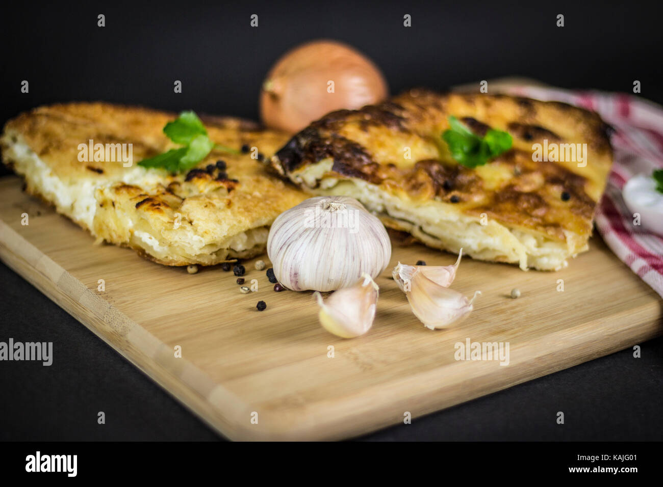 Cheese burek composition on dark background Stock Photo - Alamy