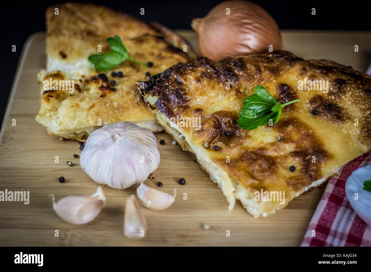 Cheese burek composition on dark background Stock Photo - Alamy