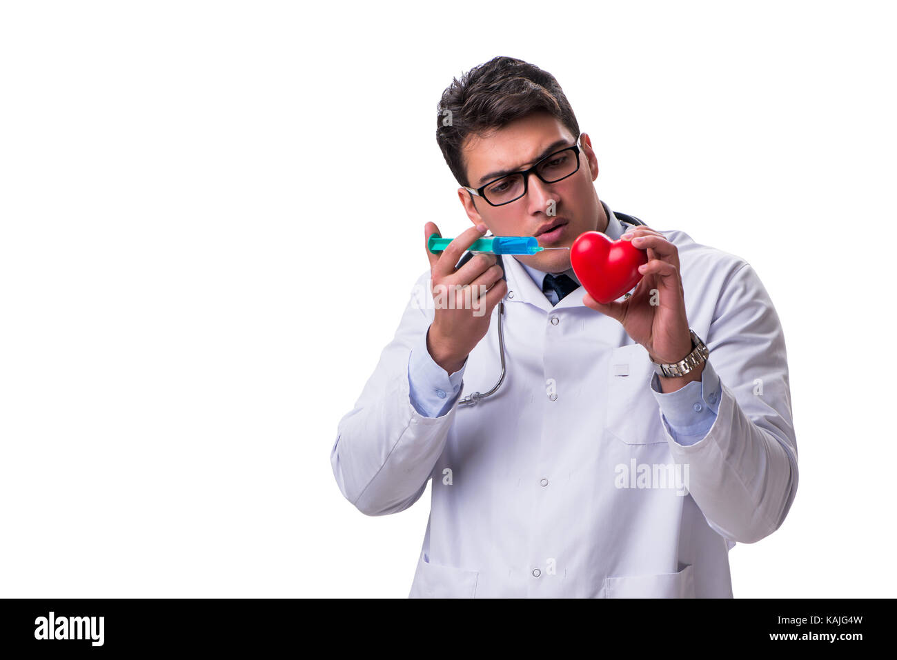 Young male cardiologist doctor holding a heart isolated on white ...