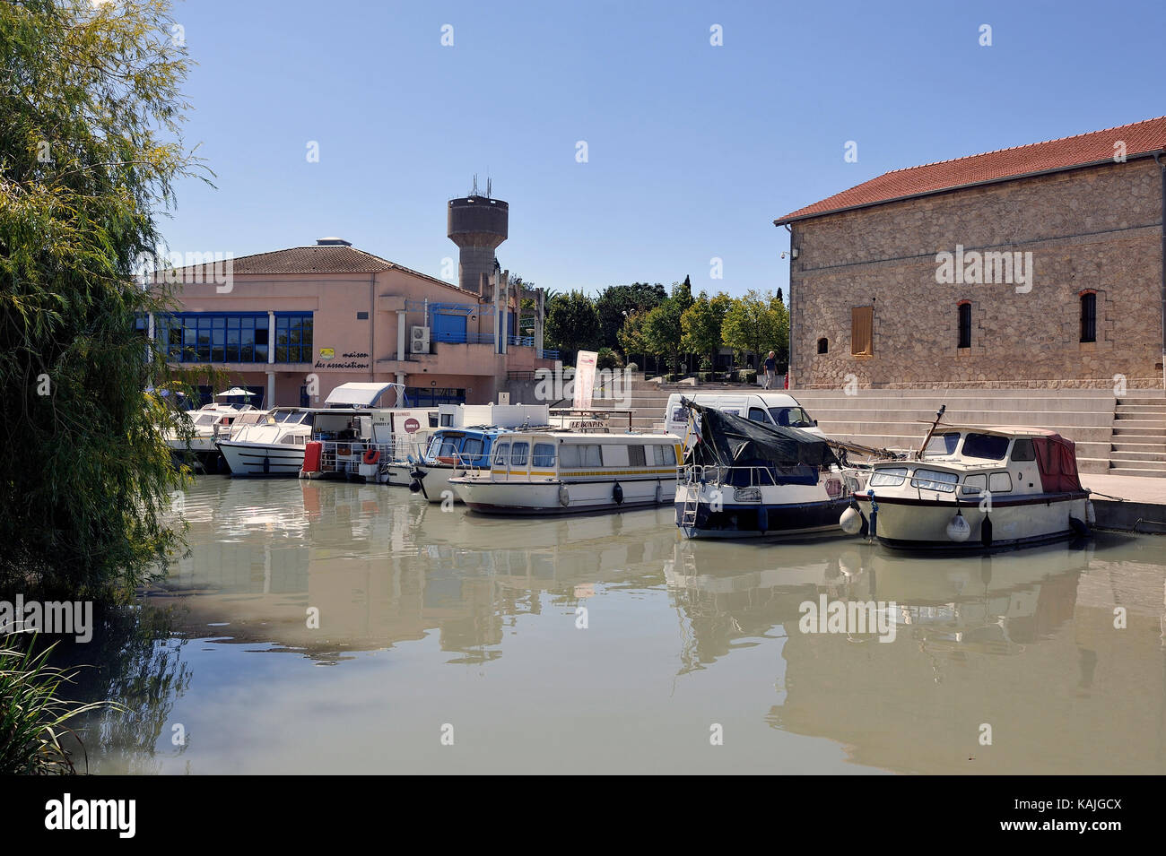 the village of Colombiers on the Canal du Midi is a tourist stop for ...