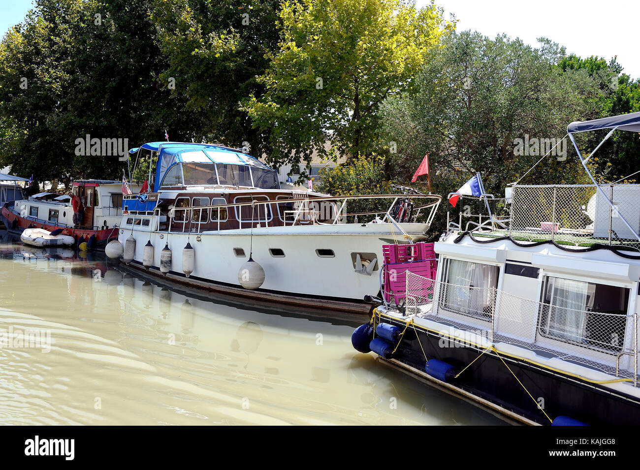 the village of Colombiers on the Canal du Midi is a tourist stop for ...