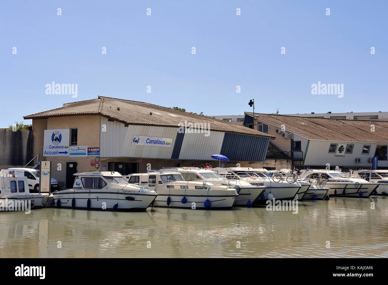the village of Colombiers on the Canal du Midi is a tourist stop for ...
