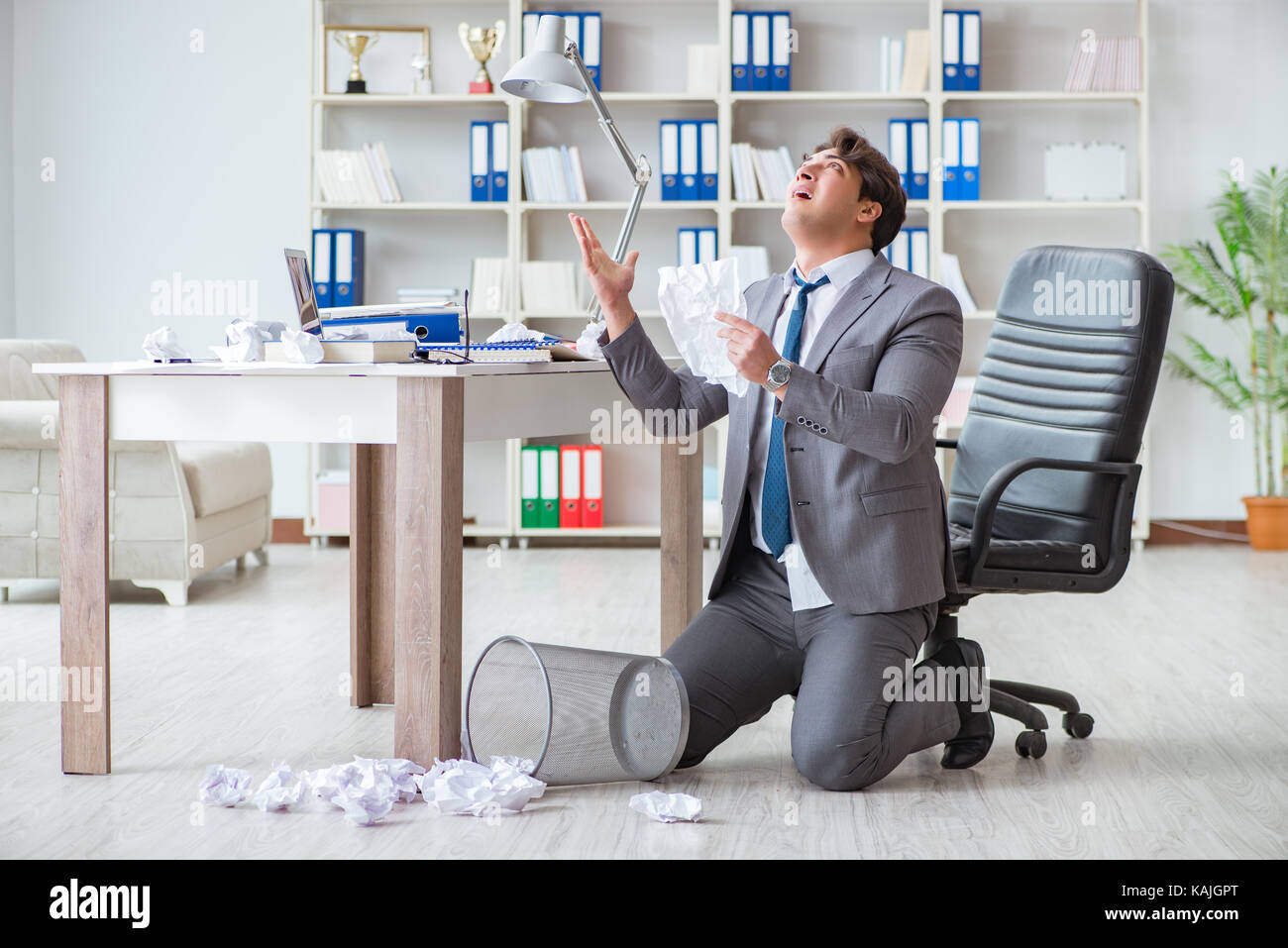 Businessman having fun taking a break in the office at work Stock Photo ...