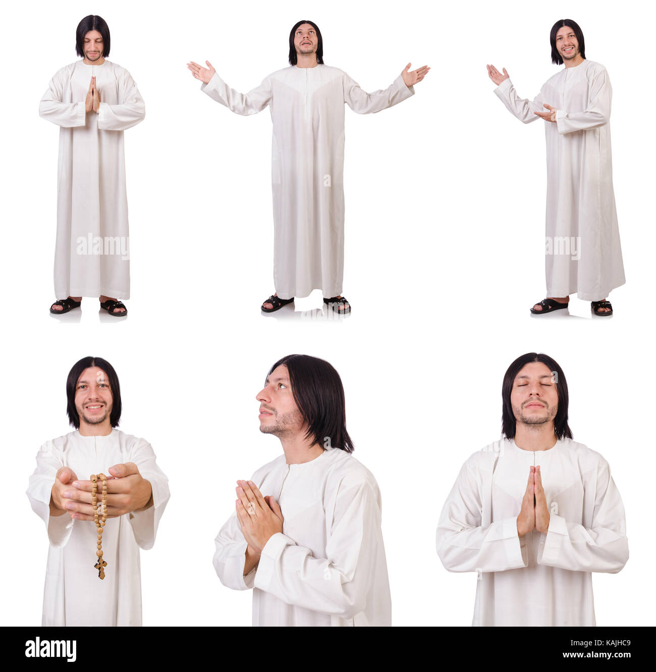Young priest with bible isolated on white Stock Photo - Alamy