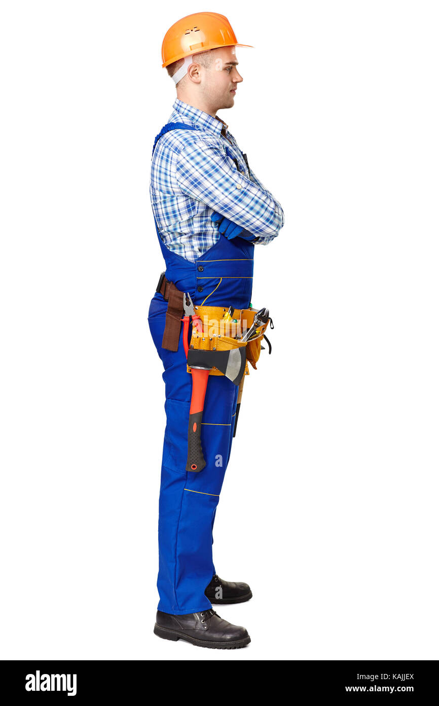 Full length side view portrait of young male construction worker ...