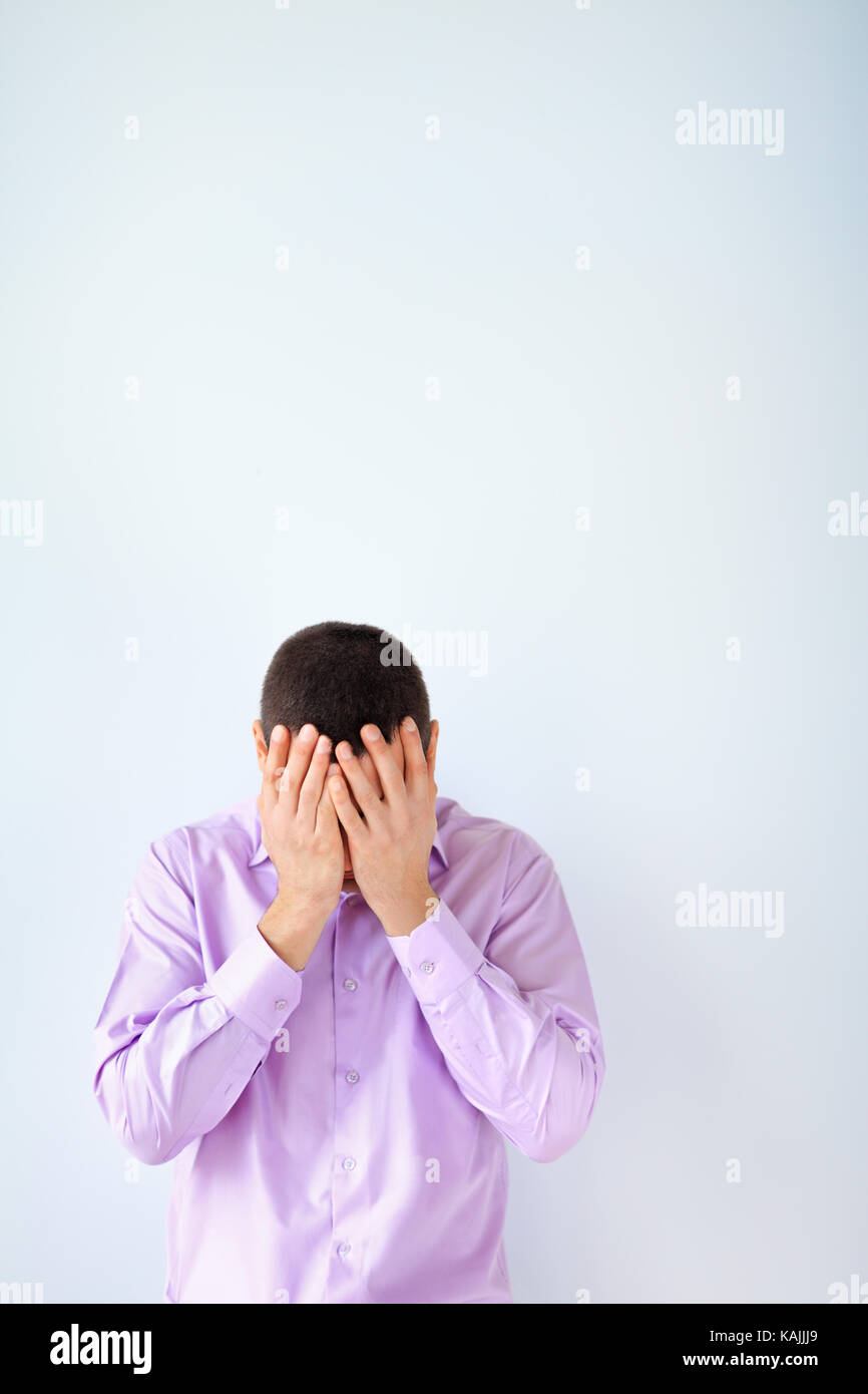Portrait of business man closed face by two hands with copy space Stock ...