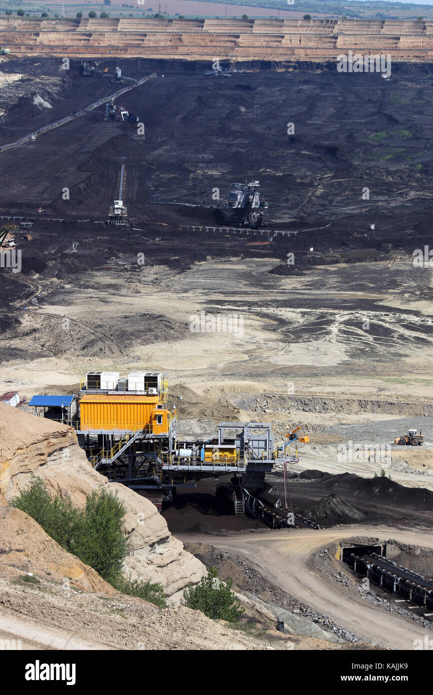 open pit coal mine with machinery and excavators Stock Photo - Alamy
