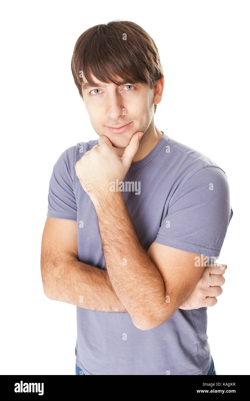 Portrait of smiling man holding hand up to chin isolated on white ...