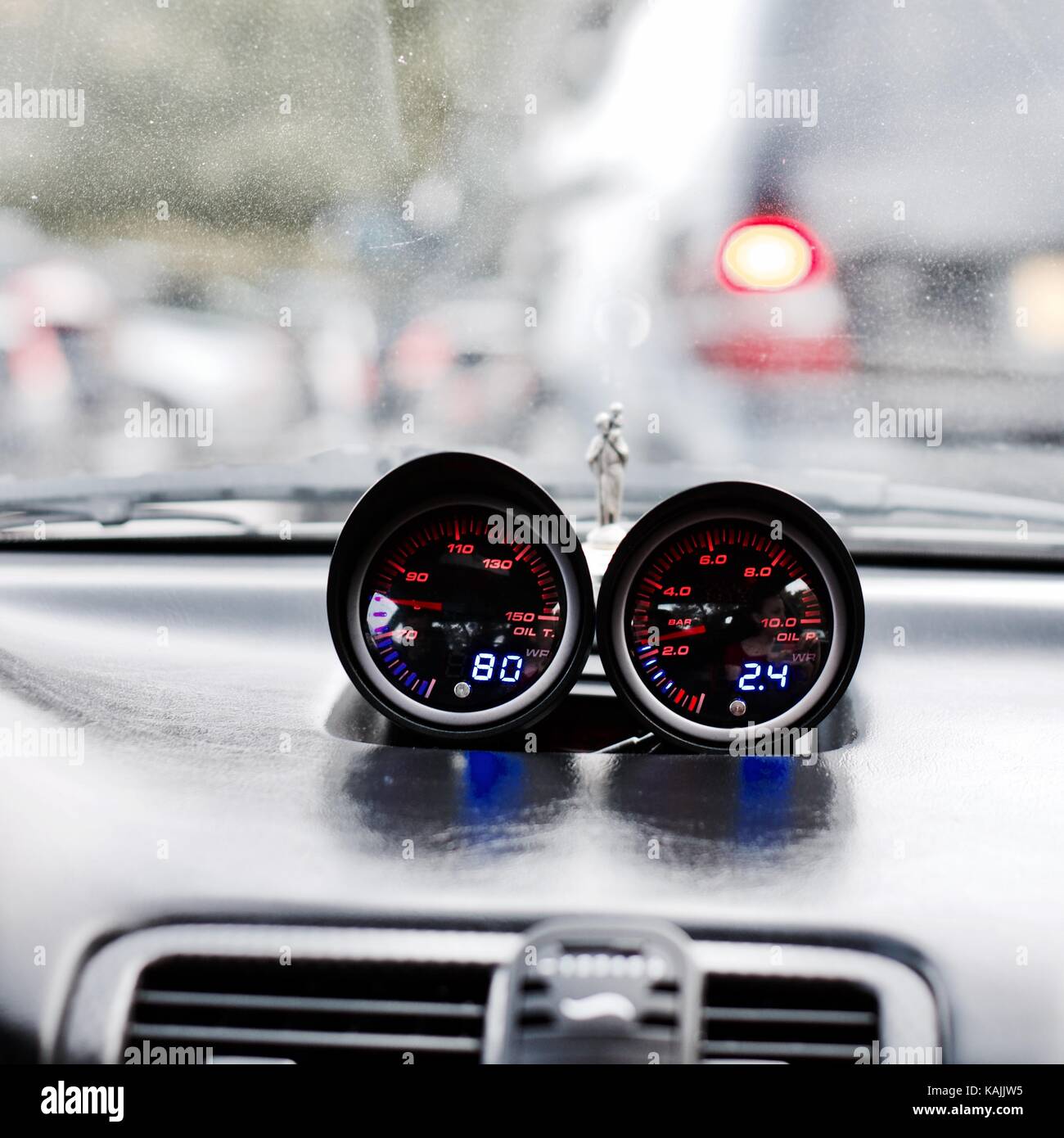 Red counters in car with blue letters. Car with dirty window Stock ...