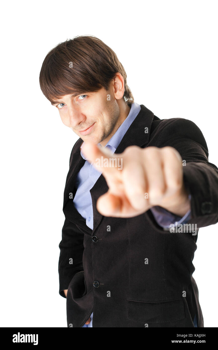 Young business man pushing an imaginary button isolated on white ...