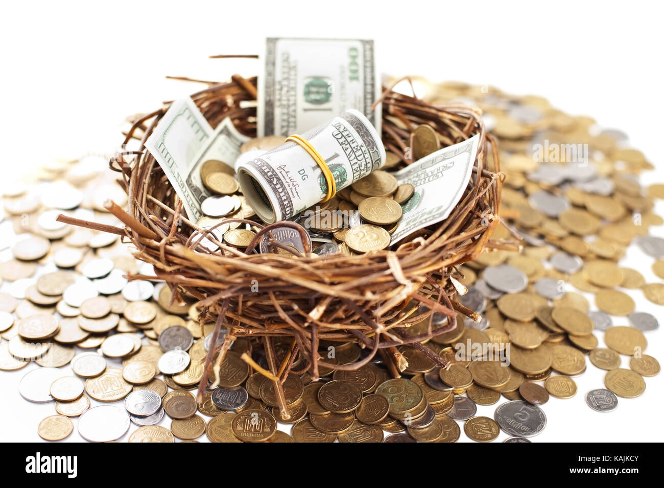 Nest egg overflowing with money Stock Photo - Alamy