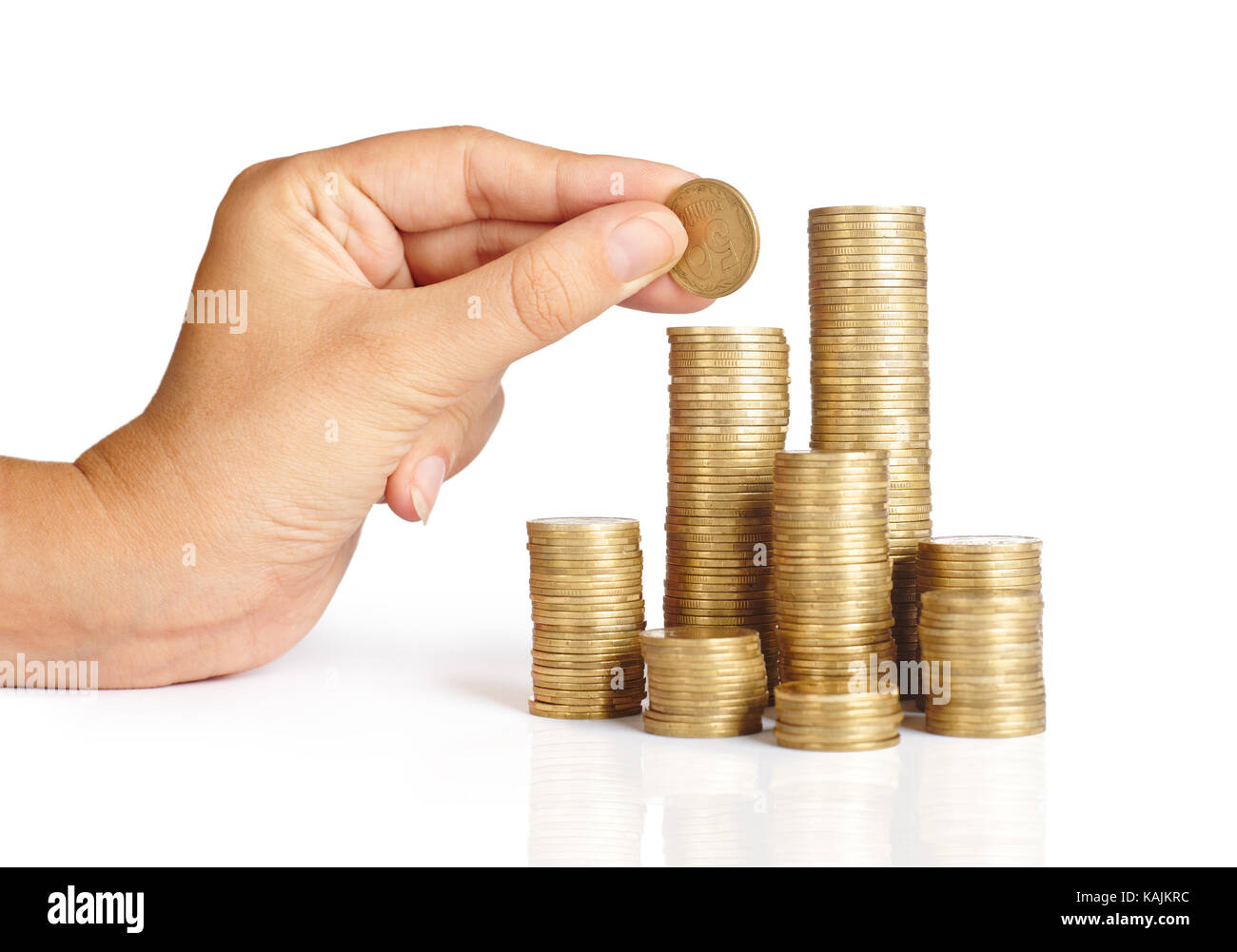 Hand put coins to stack of coins on white background ,Business idea ...