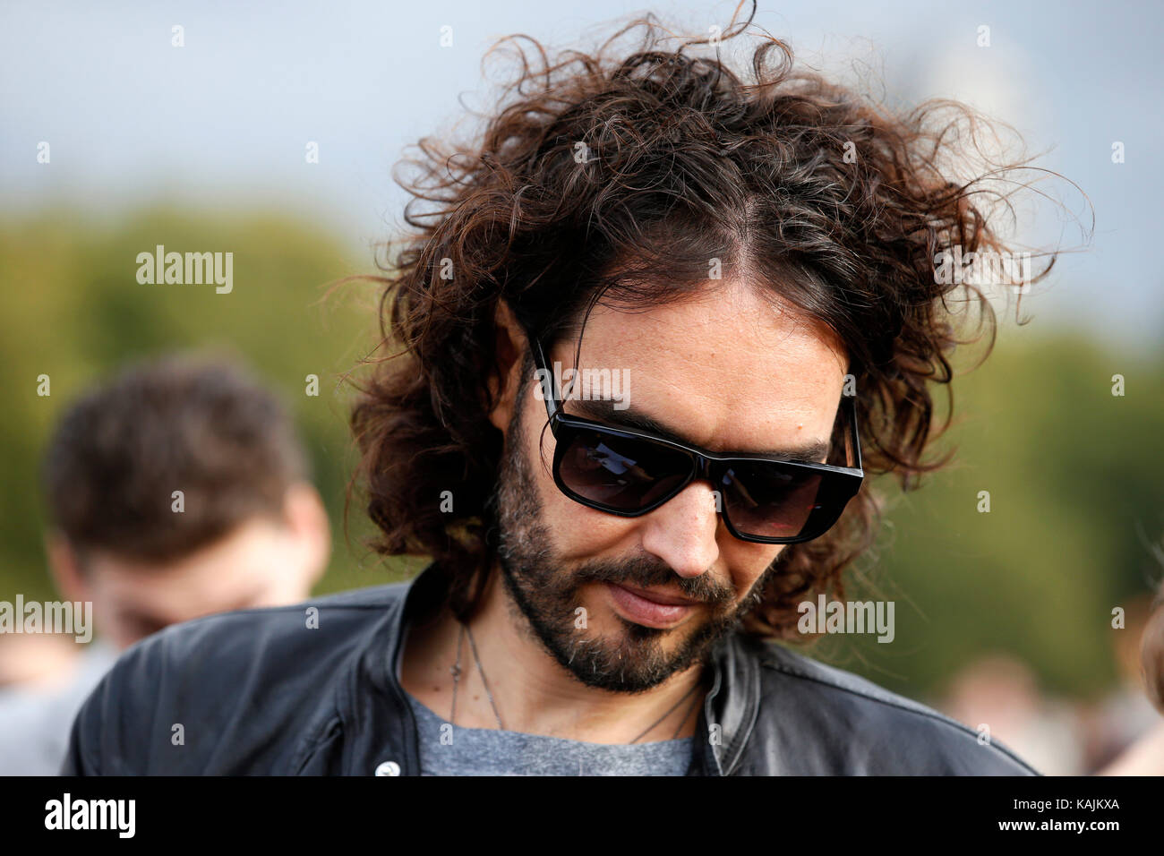 Russell Brand stands amongst the crowd at the TUC Rally "Britain needs ...