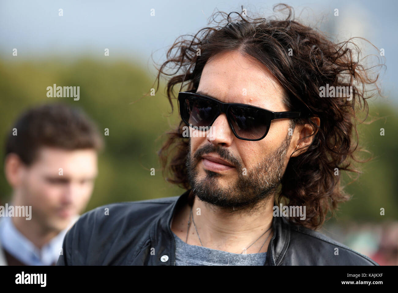 Russell Brand stands amongst the crowd at the TUC Rally "Britain needs ...