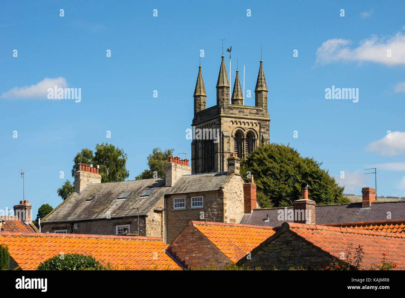 All Saints Church over rooftops, Helmsley, North Yorkshire Stock Photo ...