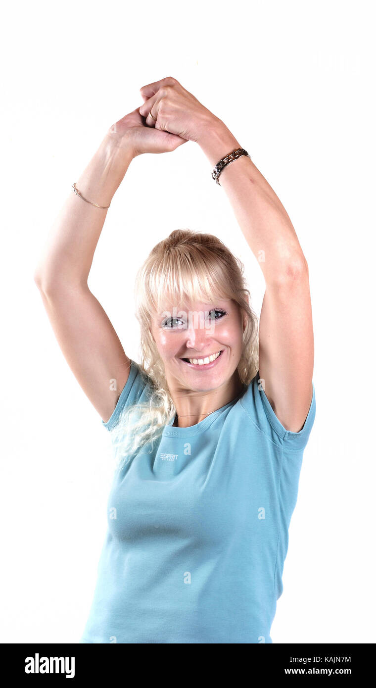 Woman Raising both arms in air Stock Photo - Alamy