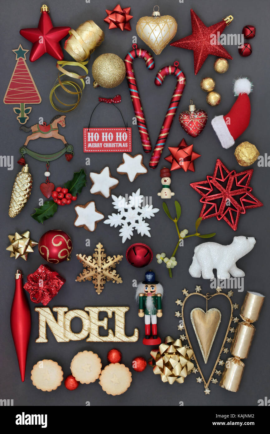Noel sign with symbols of christmas including bauble decorations, holly ...