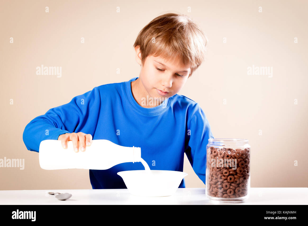 Kid Pouring Milk