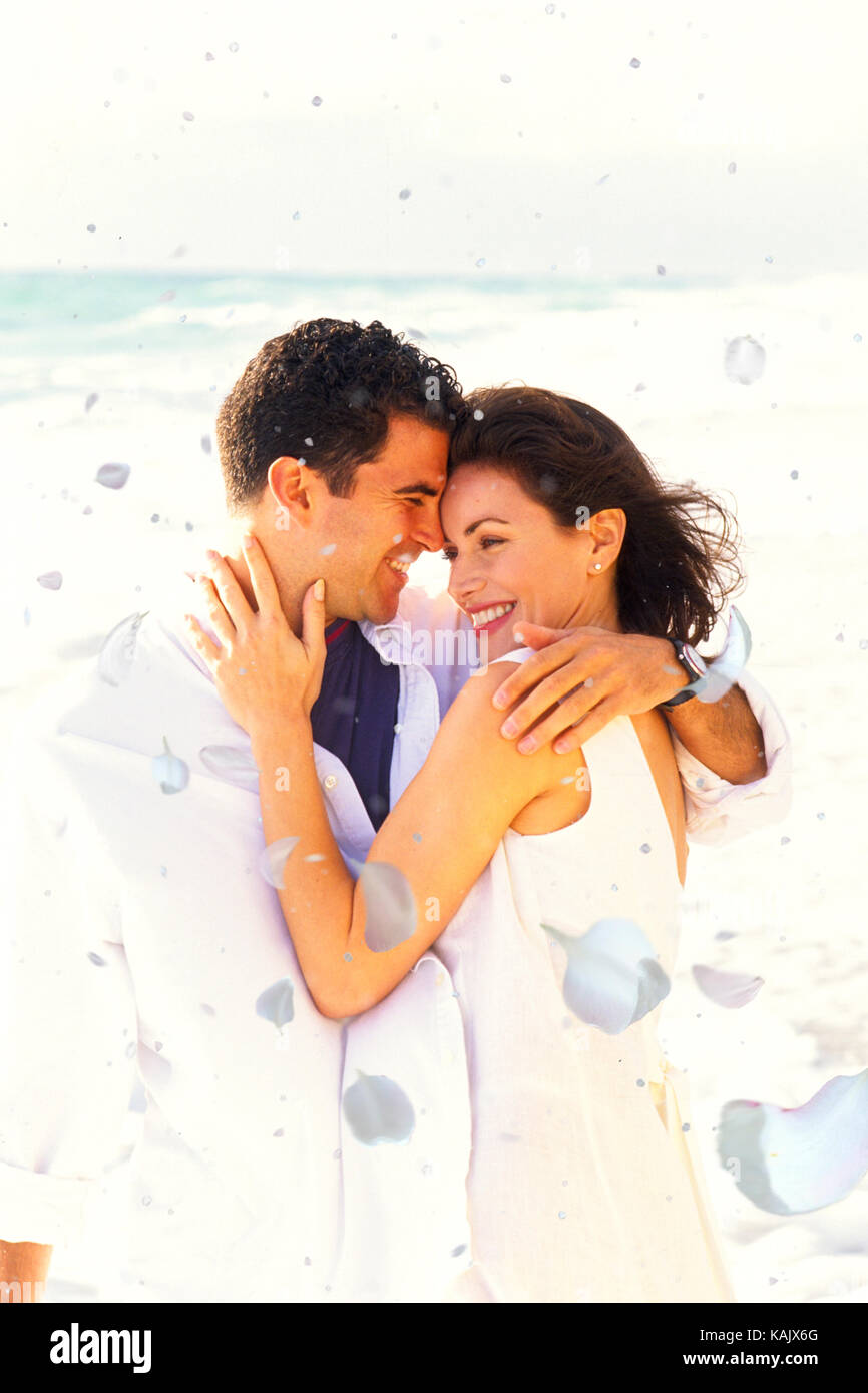 Romantic Hispanic Couple on the Beach Stock Photo - Alamy