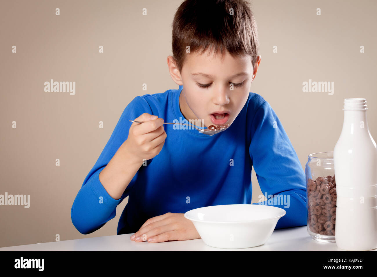 Child cereals milk hi-res stock photography and images - Alamy