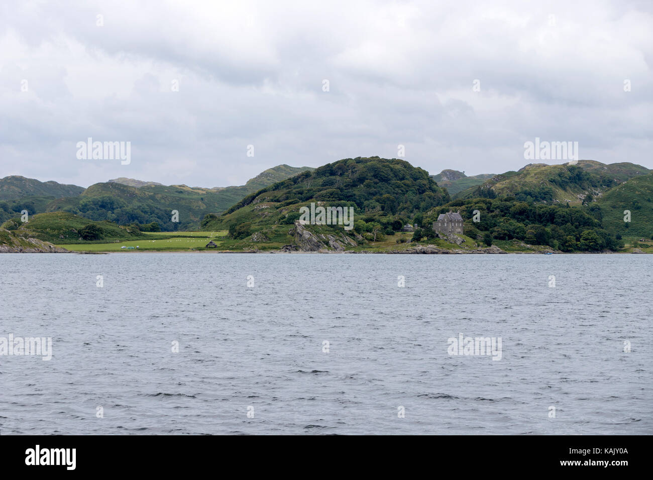 Isolated house in a isle in front of Crinan, Argyll and Bute, Scotland ...