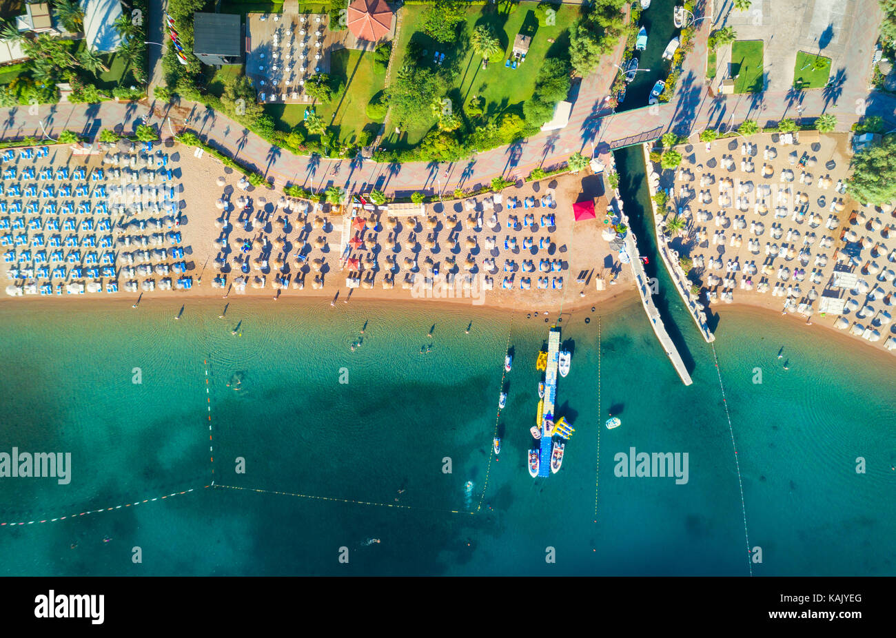 Aerial view of transparent turquoise sea, beautiful sandy beach with ...