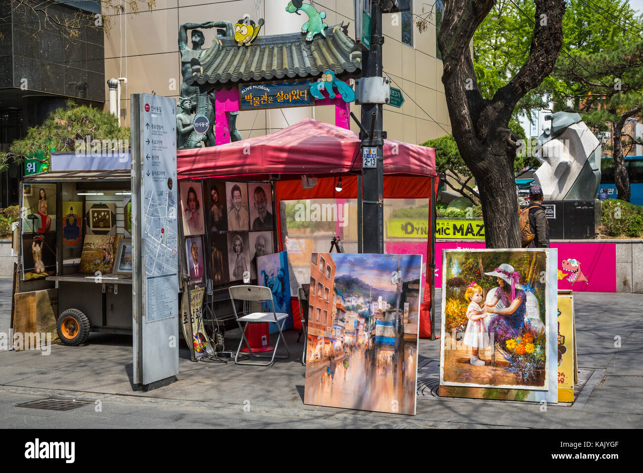 Artwork displayed along Insadong-gil street in the Insadong district of ...