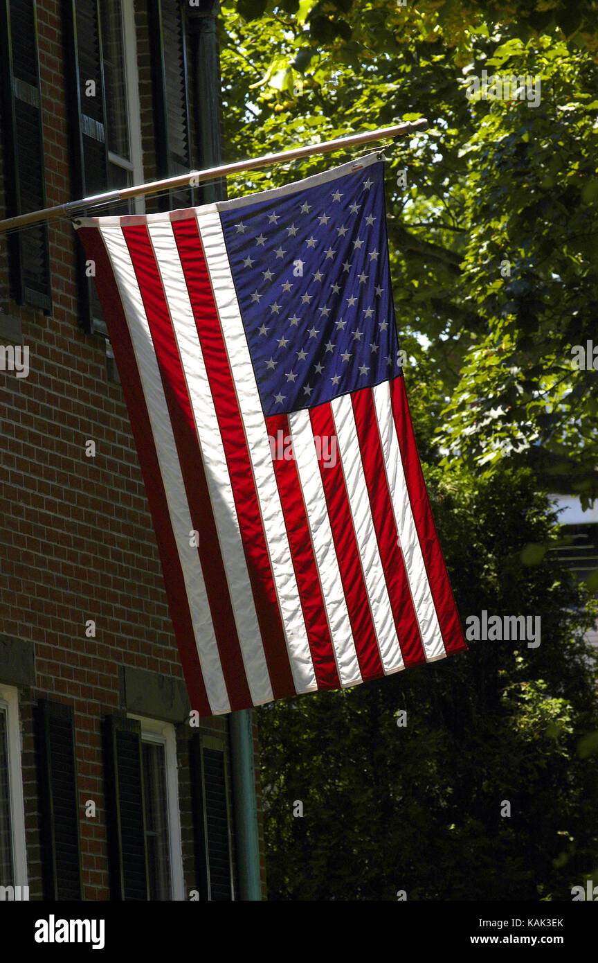 US Flag hanging on the side of a Nantucket home * Nantucket Island ...