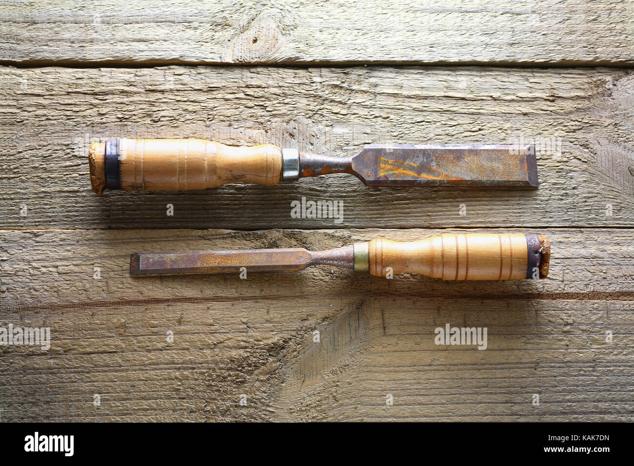 Chisels on Wooden Background Stock Photo - Alamy