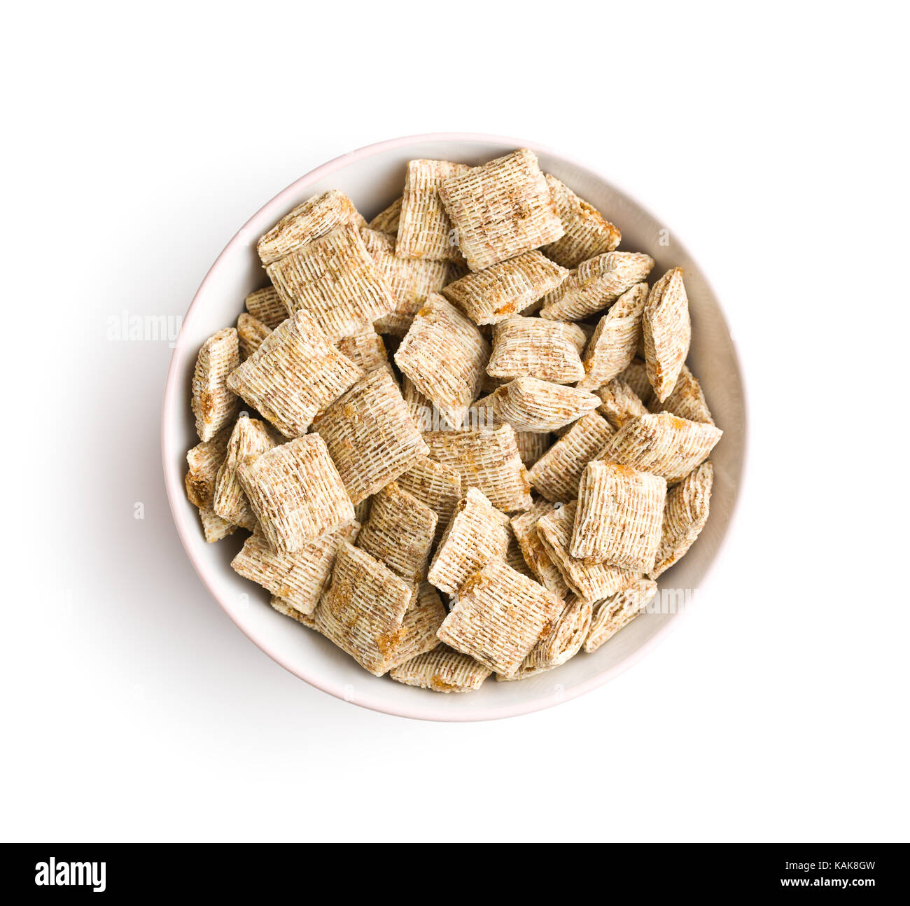 Breakfast cereal squares in bowl isolated on white background Stock ...