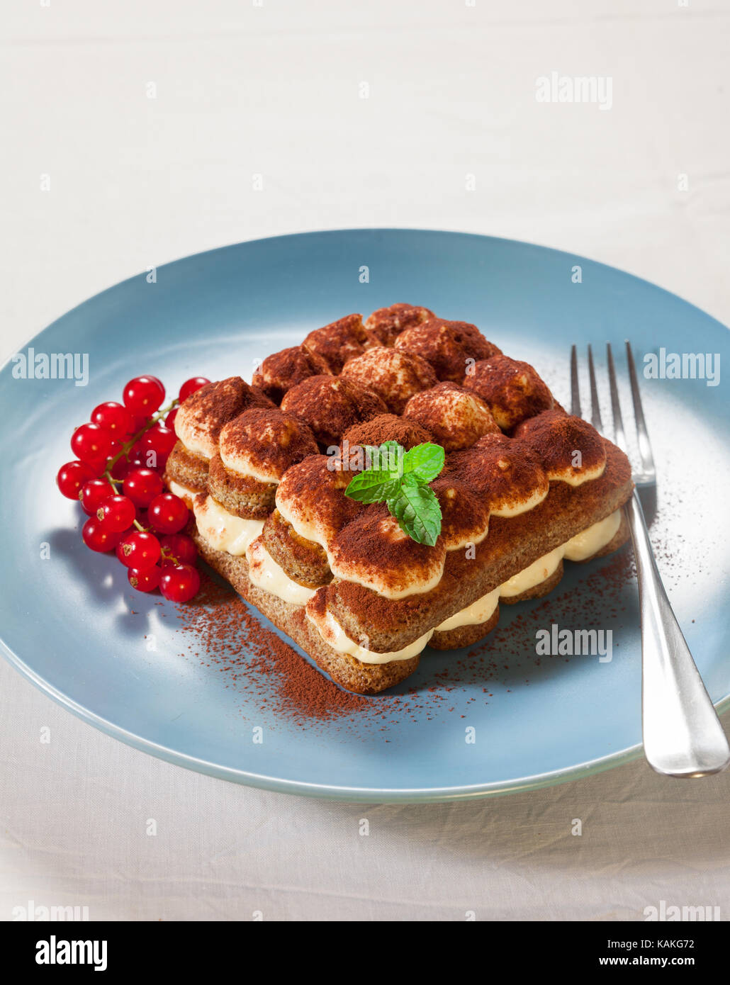 Tiramisu, traditional Italian dessert on a plate Stock Photo - Alamy
