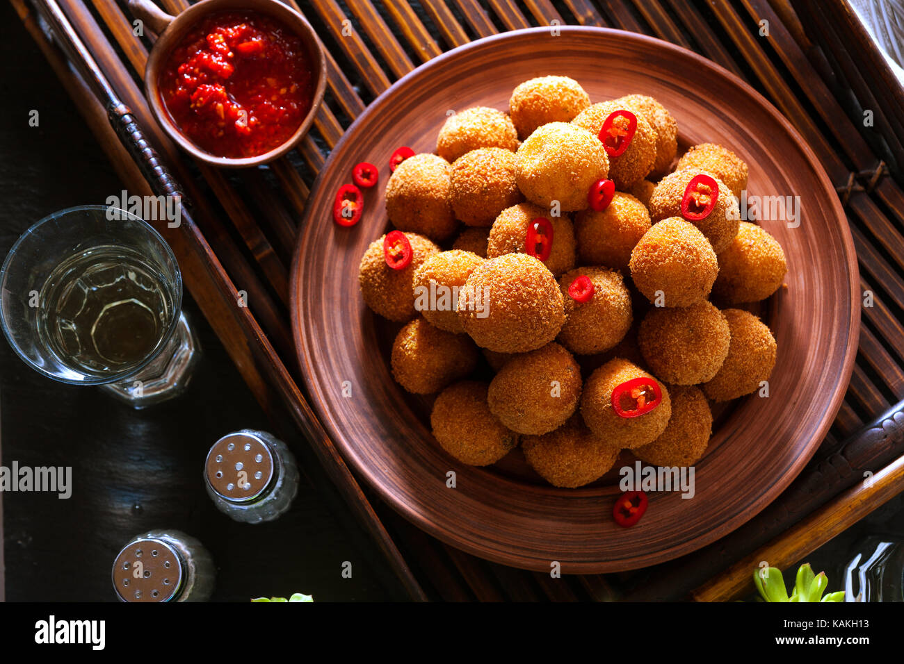 Fried Arancini rice balls . Typical Sicilian street food with spicy ...