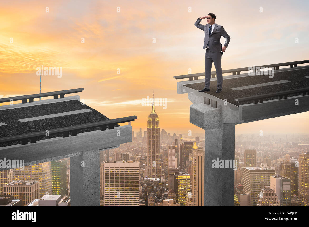 Businessman ready to overcome the broken bridge Stock Photo - Alamy