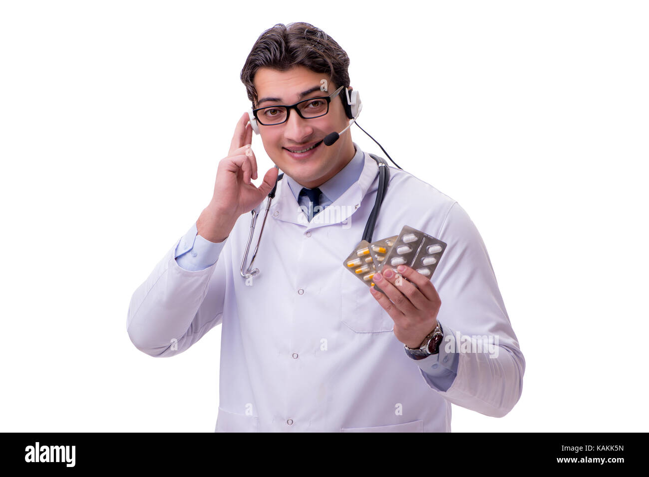 Young doctor with phone headset isolated on white Stock Photo - Alamy