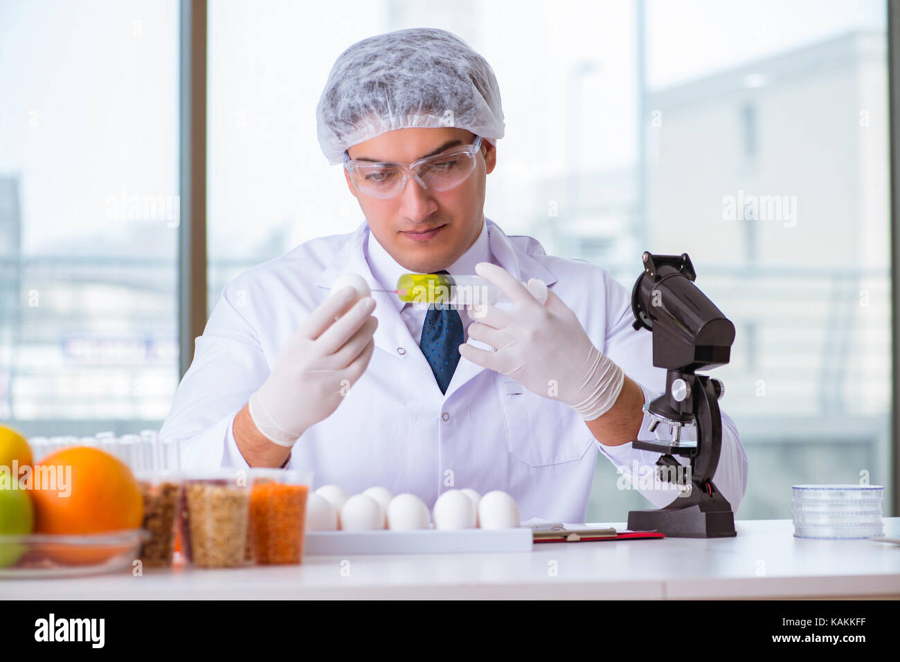 Nutrition expert testing food products in lab Stock Photo - Alamy