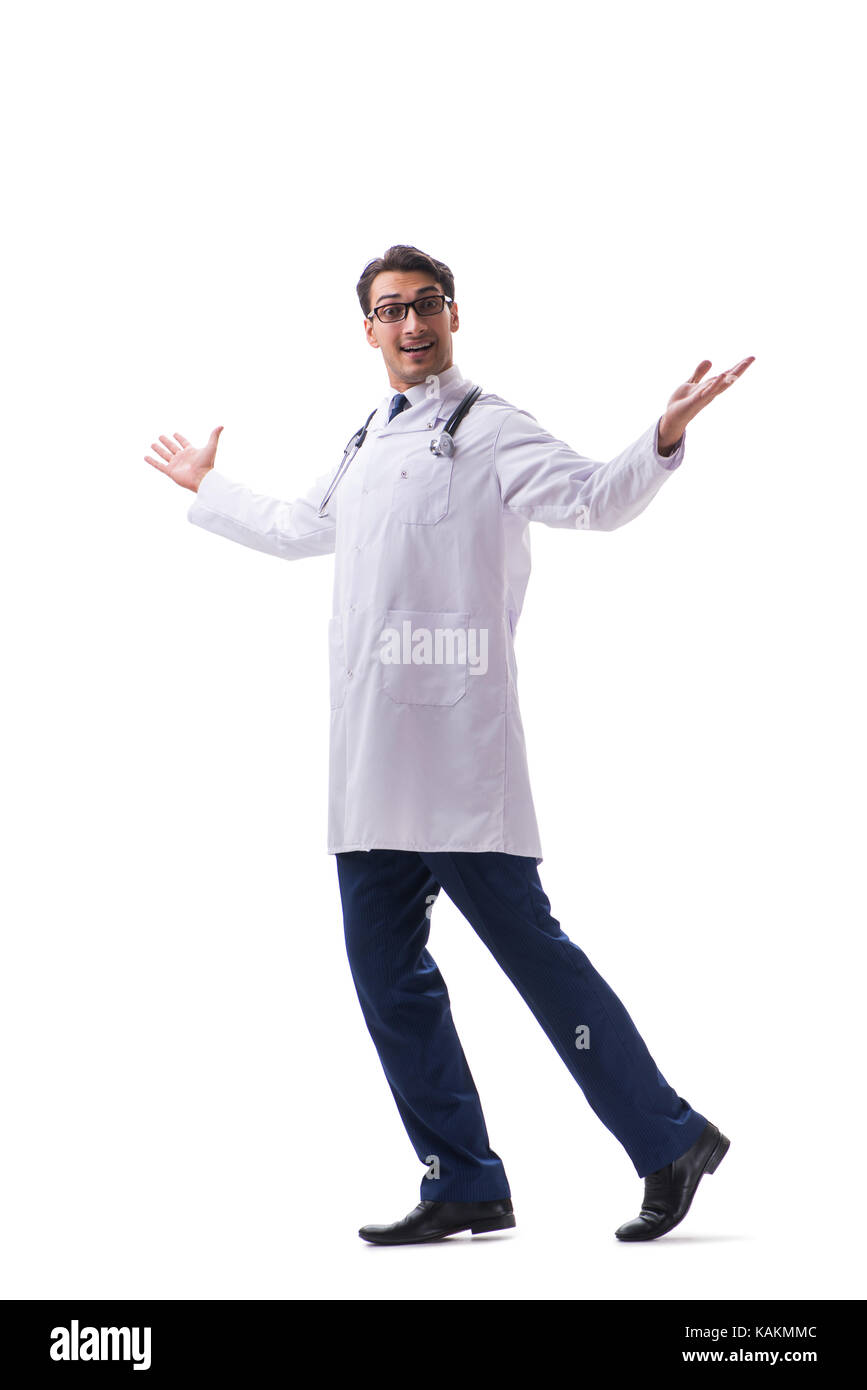 Young doctor physician standing walking isolated on white background ...