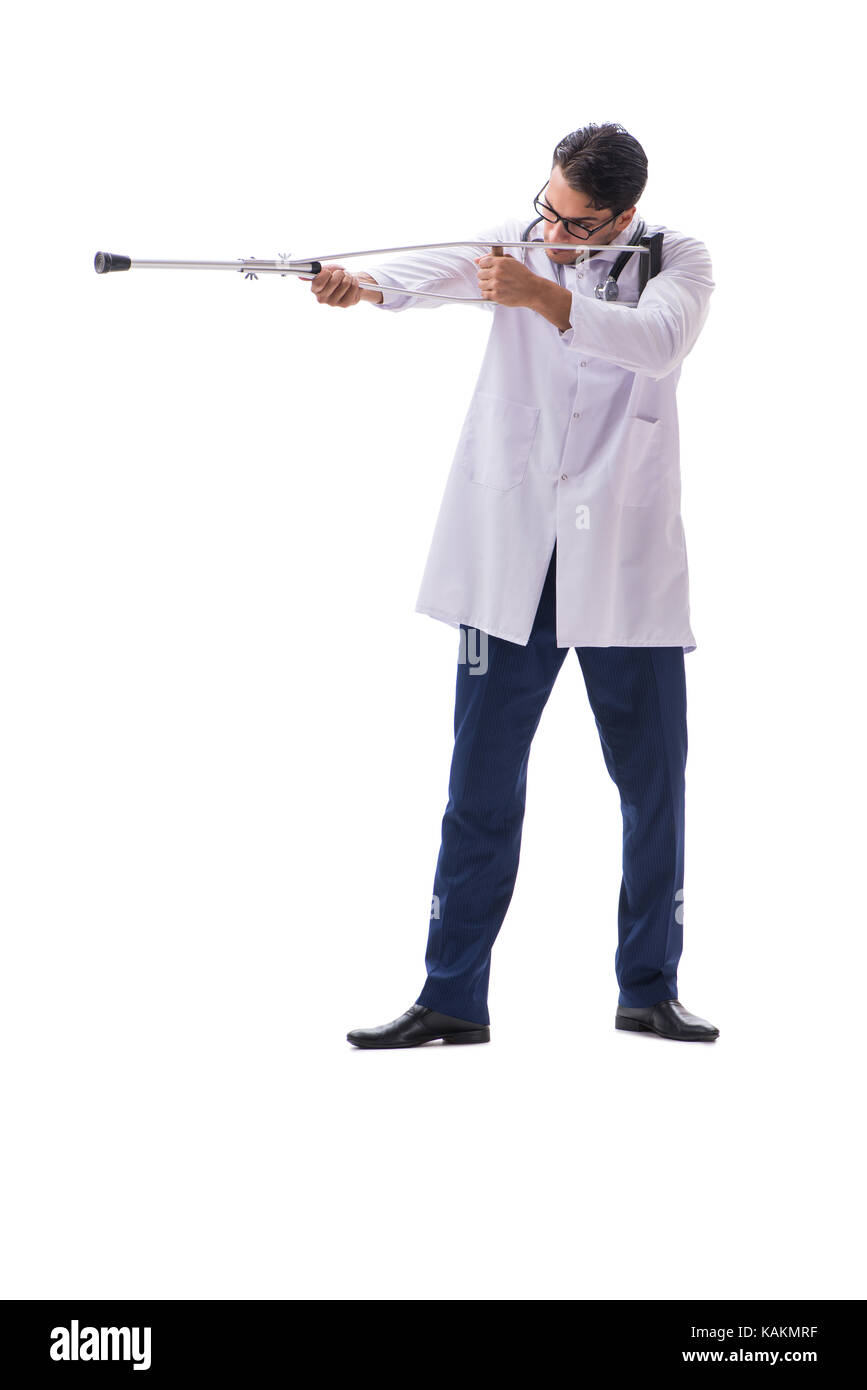 Young doctor physician standing walking isolated on white background ...