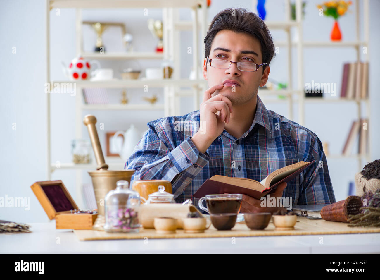 Professional tea expert trying new brews Stock Photo - Alamy