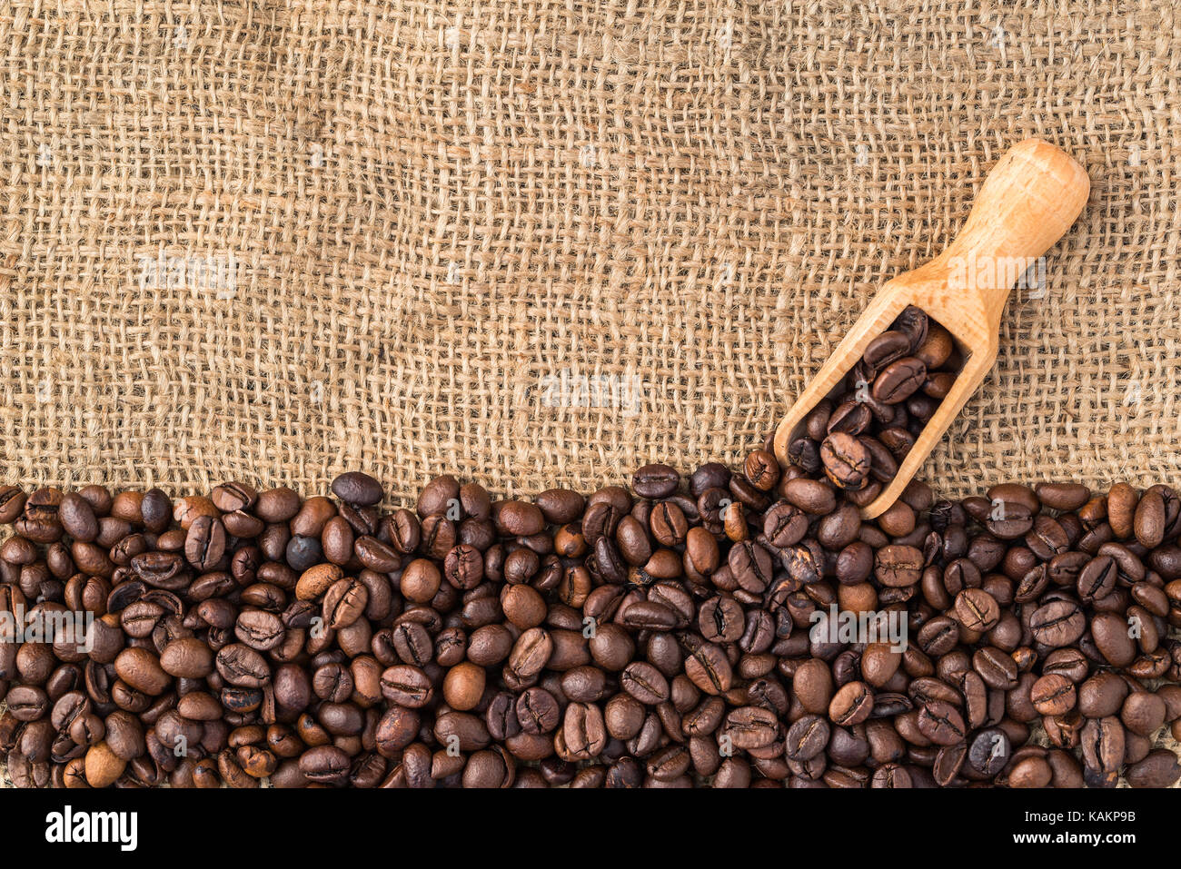 Mixture of different kinds of coffee beans with ladle. Coffee ...