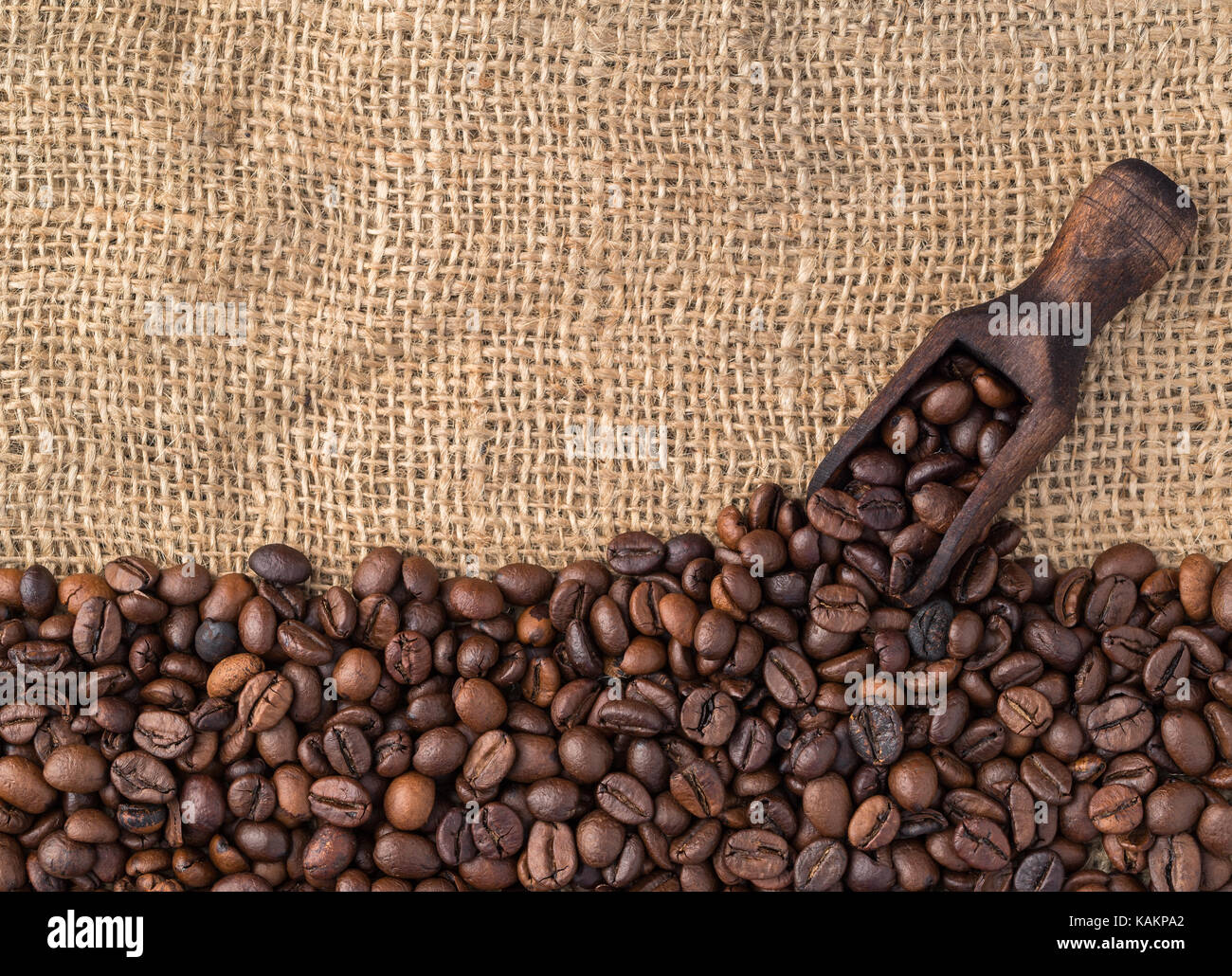 Mixture of different kinds of coffee beans with ladle. Coffee ...