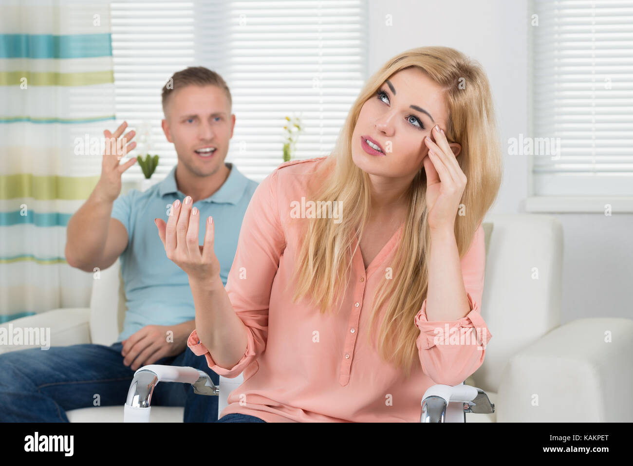 Photo of young couple having argument at home Stock Photo - Alamy